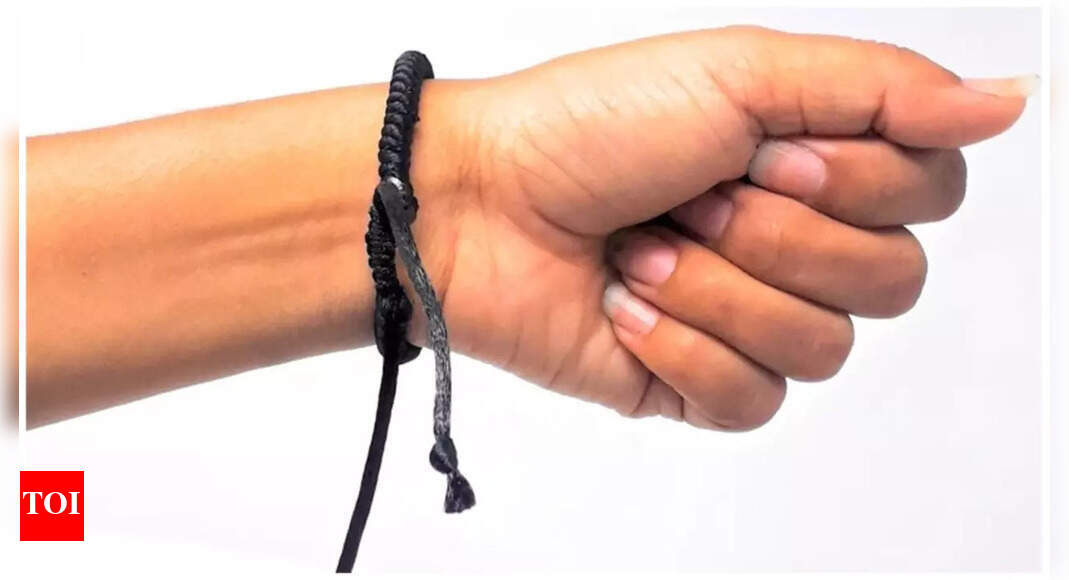 What are the benefits of wearing a black thread? - Times of India