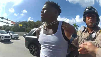 Tyreek Hill: Police footage shows officers forcing Miami Dolphins' Tyreek Hill to ground during ...