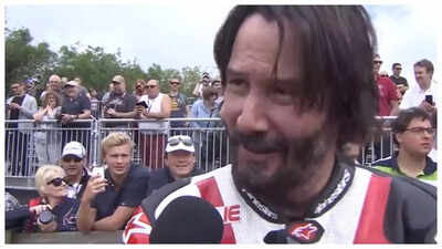 Keanu Reeves escapes injury during pro auto racing debut | - Times of India