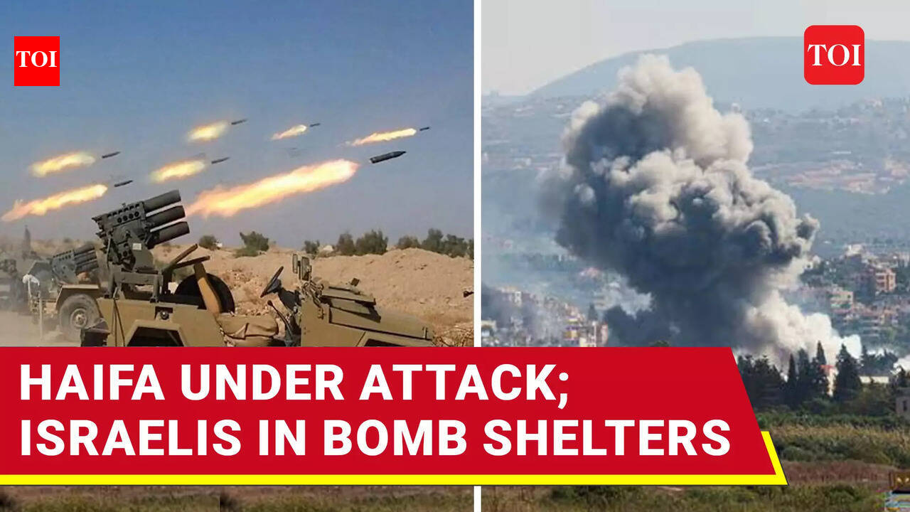 Israeli Military Base 'Bombarded' With Missiles In Haifa; Israelis Flee ...