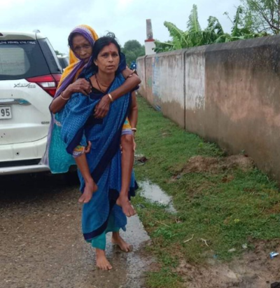 ASHA worker carries elderly woman on her back to cyclone shelter ...