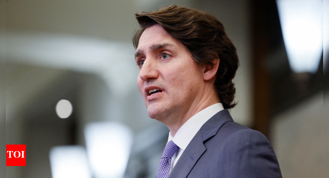 Canada: 24 of Justin Trudeau's party MPs ask him to quit - Times of India