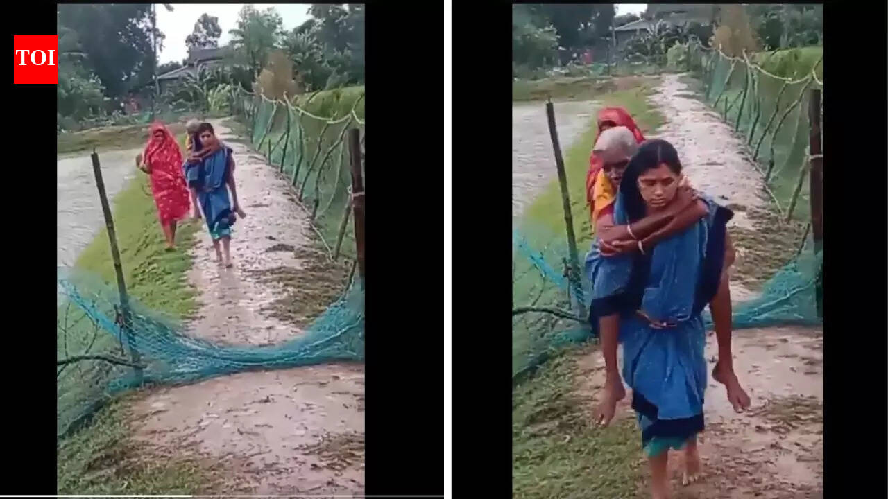 Cyclone Dana: ASHA worker carry an elderly women on her shoulders to ...