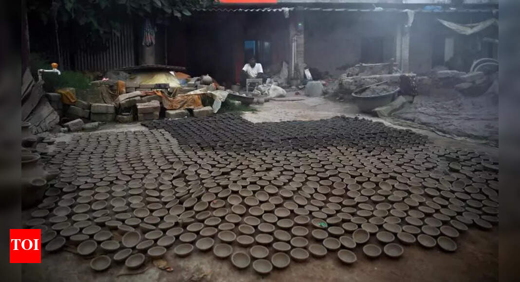 Deepotsav: Record-Breaking 80,000 Diyas Form Swastik at Ram Ki Paidi ...