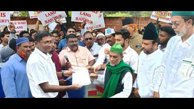 Waqf Property: Waqf Controversy Halts Housing Titles for Slum Dwellers ...