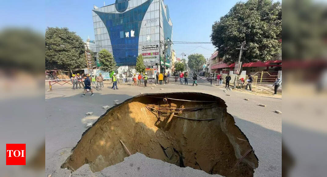Road cave-in creates crater big enough to swallow truck | Lucknow News ...