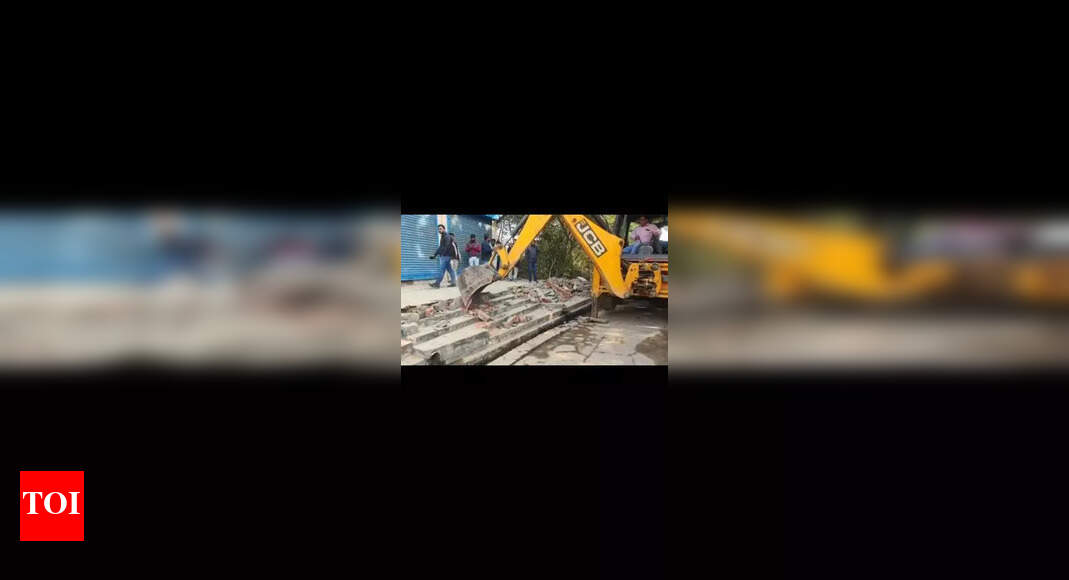 GMC bulldozes illegal structures in Khariya Pokhara amid protest ...