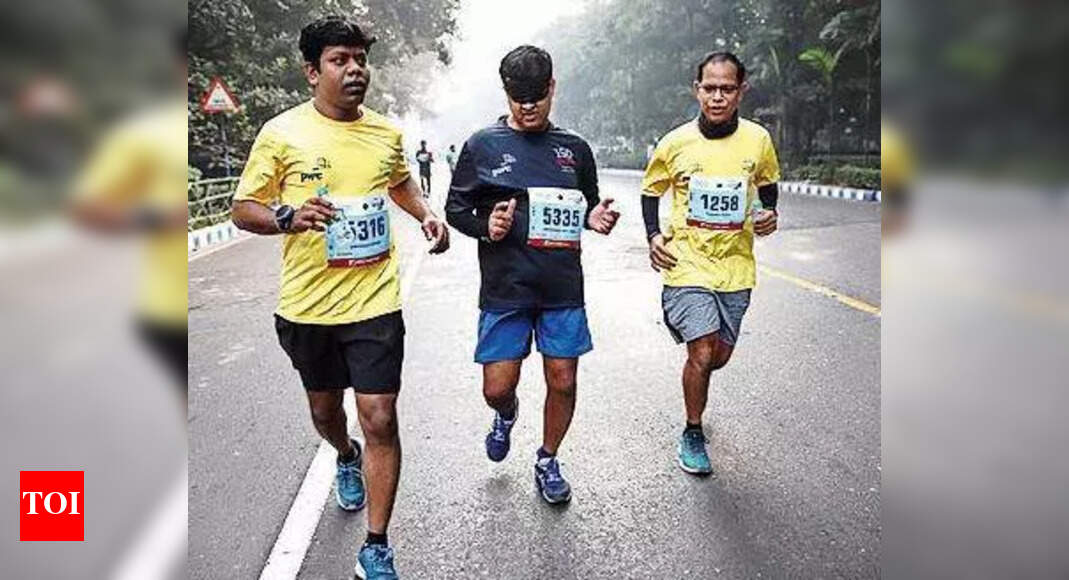 Blind runner strives for Asia record by finishing full marathon without ...