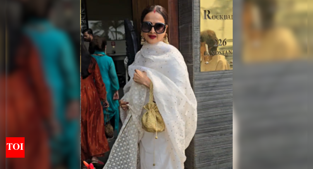 Rekha in white suit and signature red lips turns casual outing into a ...