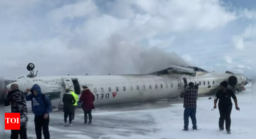 Delta flight’s terrifying flip at Toronto airport leaves passengers in ...