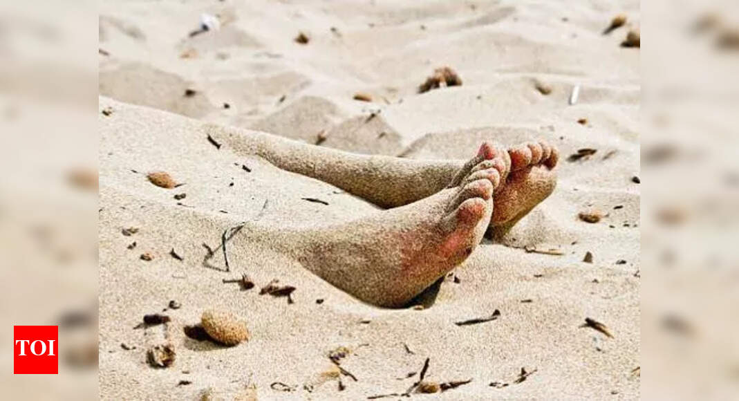 Body found buried in sand stocks | Vijayawada News - The Times of India