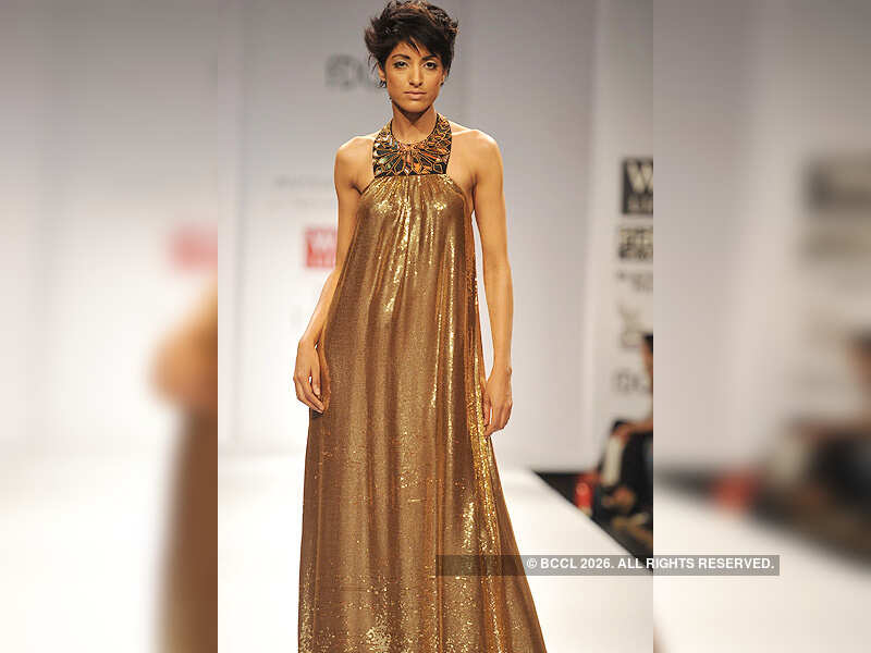 Jesse Randhawa walks the ramp to showcase a creation by designer Reynu ...