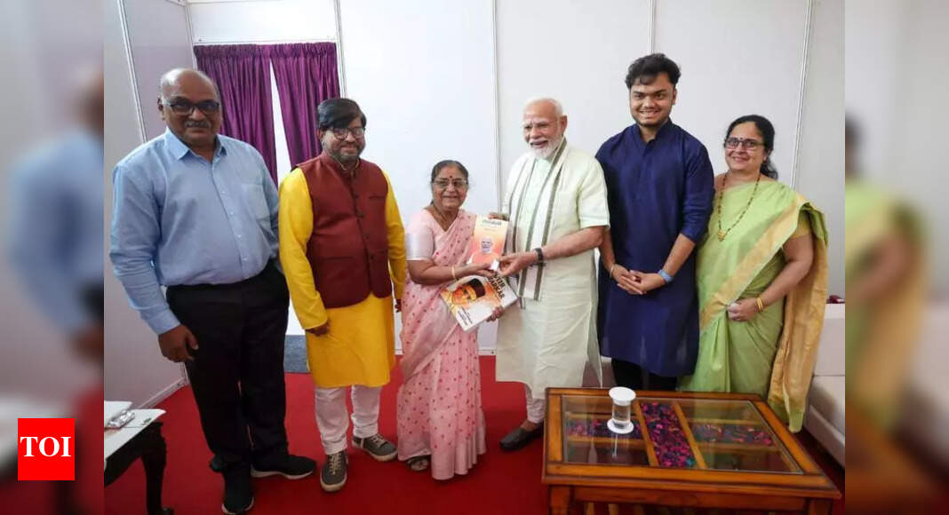 City author Bhadbhade presents PM book on his political journey ...
