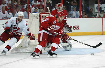 Friday night fight: Hurricanes eye statement win while Red Wings fight ...