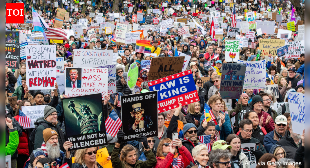 'Tax the rich, not penguins': Cheeky slogans at ‘Hands Off!’ protests ...
