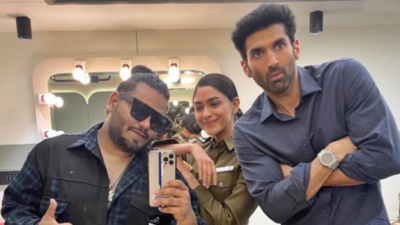 Mrunal Thakur treats us with a goofy throwback pic with her 'Gumraah' co-star Aditya Roy Kapur ...