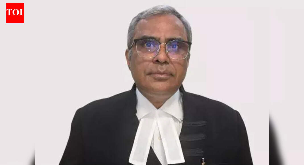Justice Sharma takes oath as Cal HC judge | Kolkata News - The Times of ...