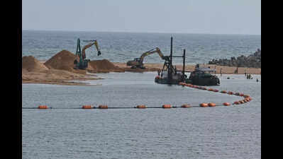 Finally, sandbar removal begins at Muthalapozhi - The Times of India