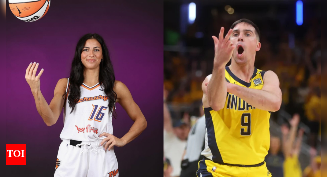 TJ McConnell and Megan McConnell exchange solidarity gestures as the ...