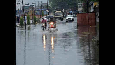 Road caves in, areas waterlogged as rain batters city | Ranchi News ...
