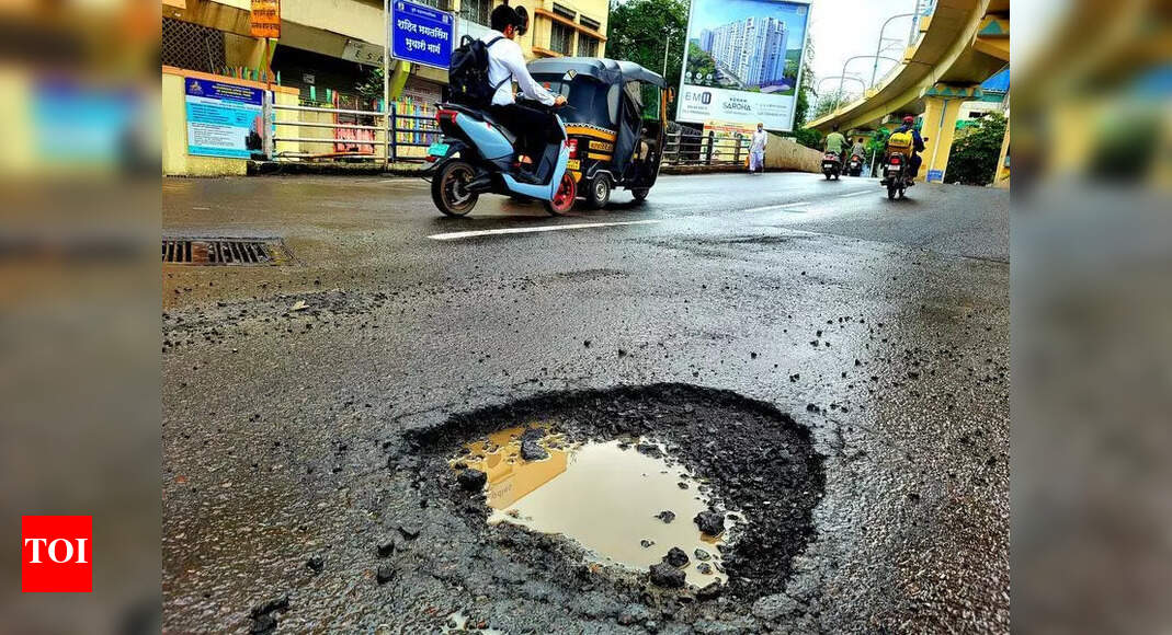 Pune roads develop potholes after rain, causing traffic jams | News ...