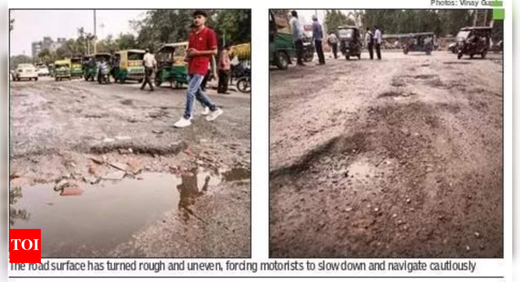 Riddled with craters, commuting to office hub Udyog Vihar turns painful ...