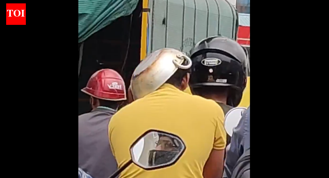 Peak Bengaluru moment: Man spotted wearing frying pan instead of helmet ...