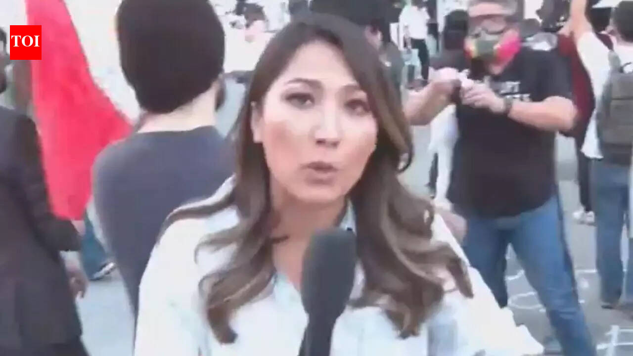 Watch: CNN reporter hit by pepper spray while reporting live during ...