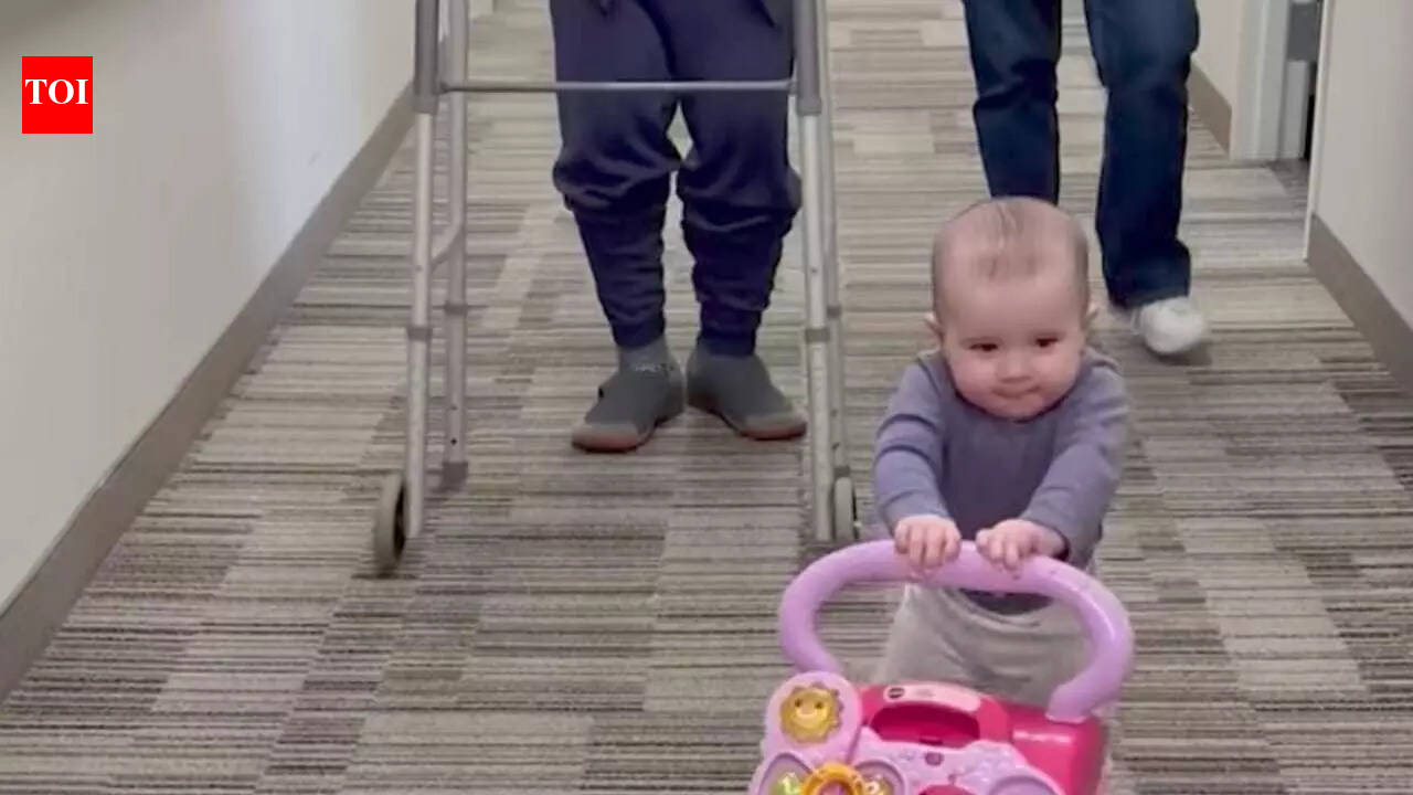 Viral Baby Video: Adorable baby takes a walk with Grandpa using a ...