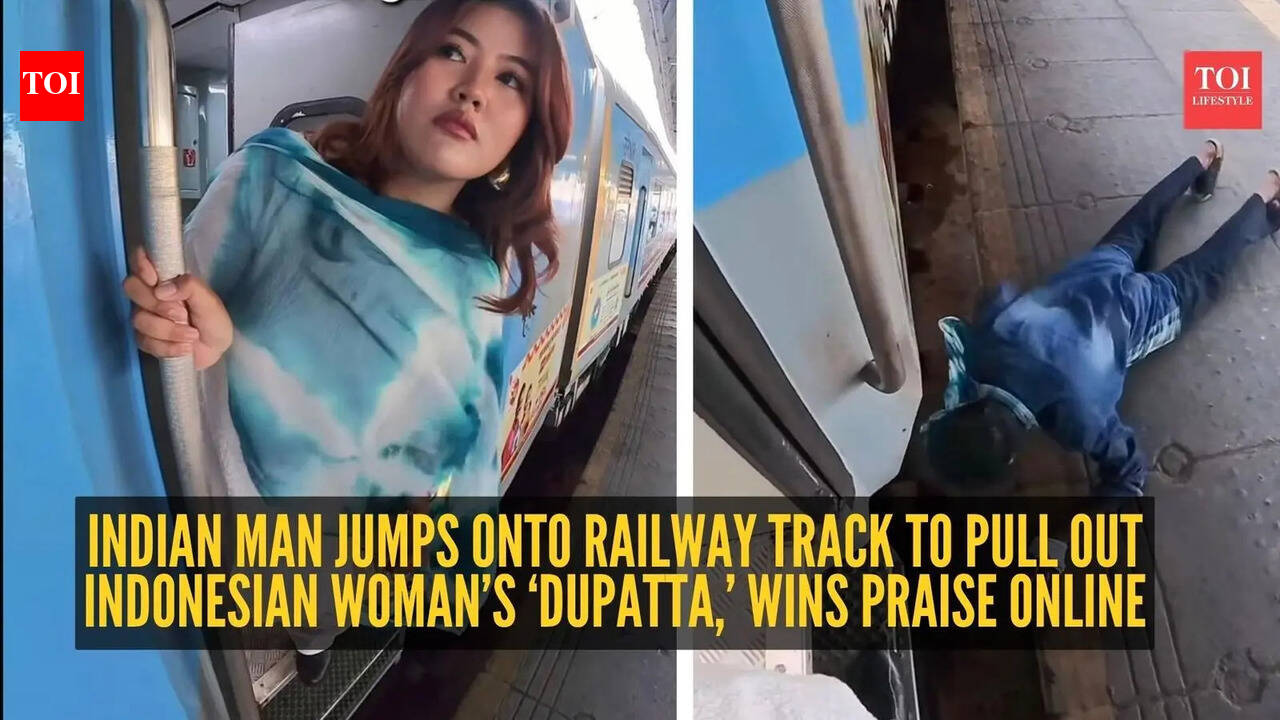 Indian man jumps onto railway track to pull out Indonesian woman’s ...