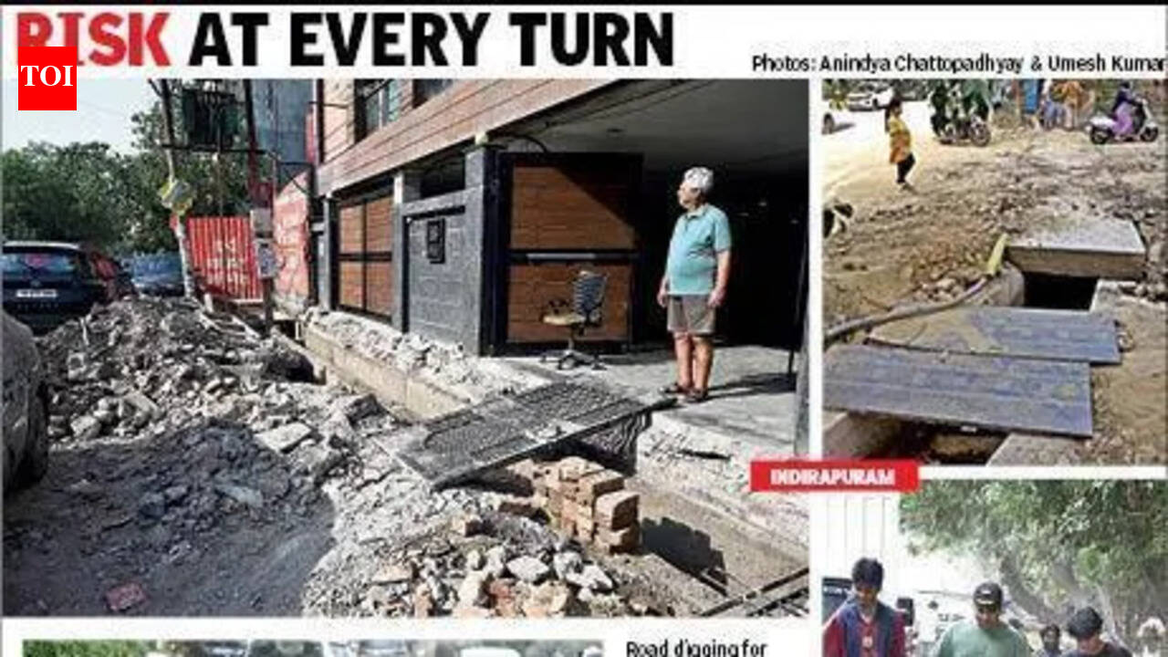 Deep craters, exposed rods: A risk at every turn here | Noida News ...