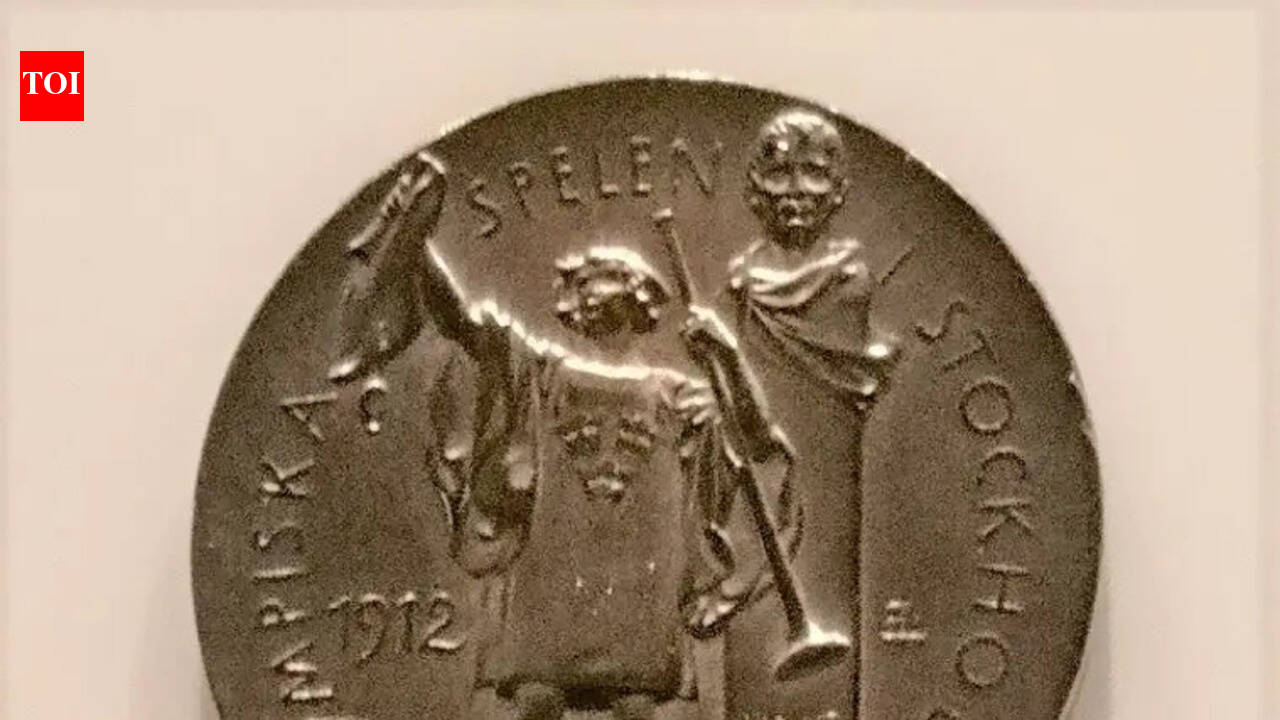 At least six grams of gold coat an Olympic gold medal, which otherwise ...