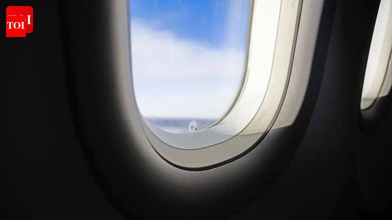 Why do airplane windows have tiny holes? The pressure-balance safety ...