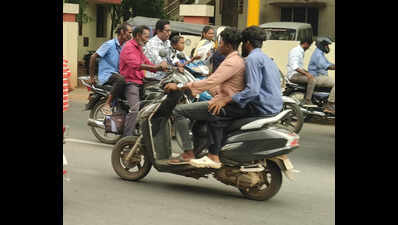 Over 1.5 lakh helmet, drunken driving cases booked in central districts ...