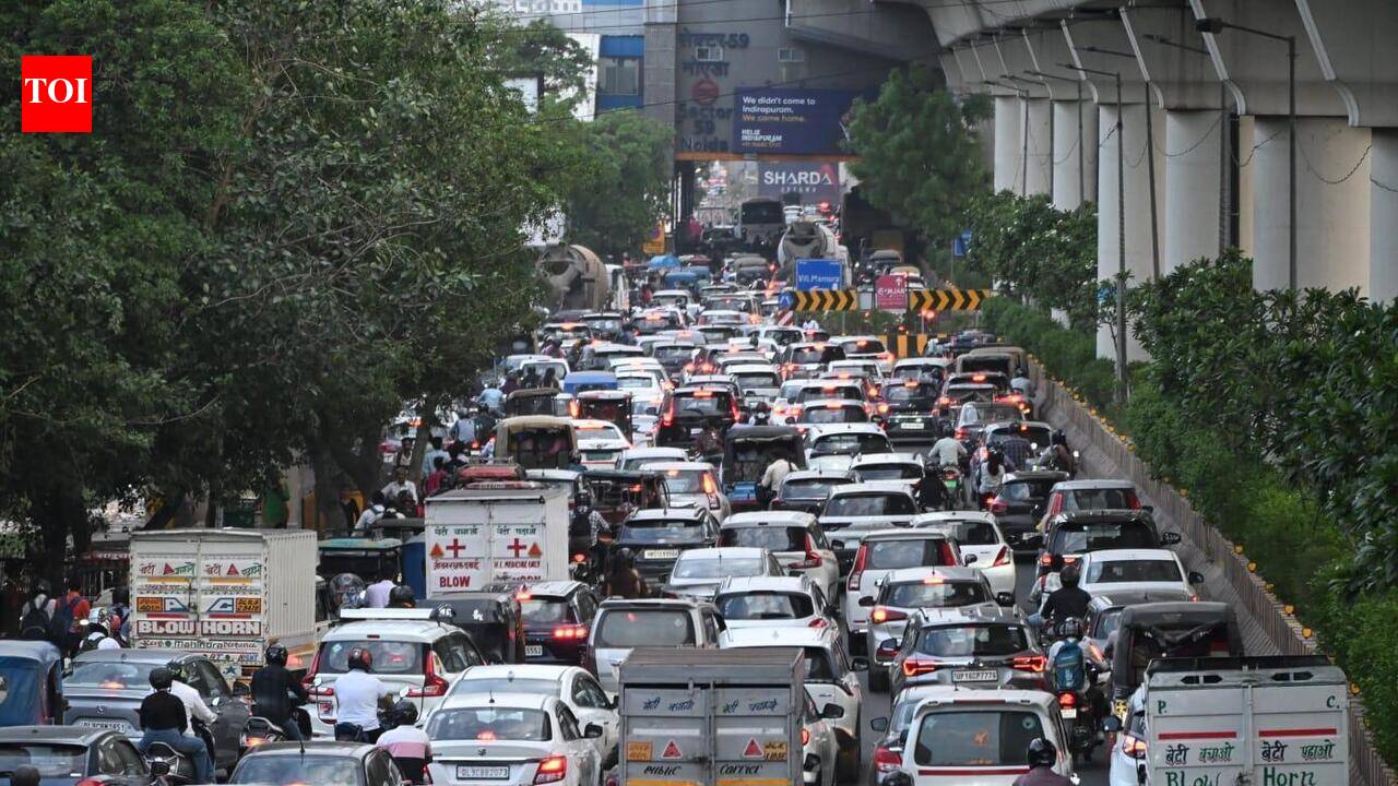 Wide, signal-free corridor, but traffic still crawls through Noida’s ...