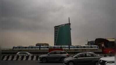 Delhi sees light rain, marginal fall in max temperature | Delhi News ...