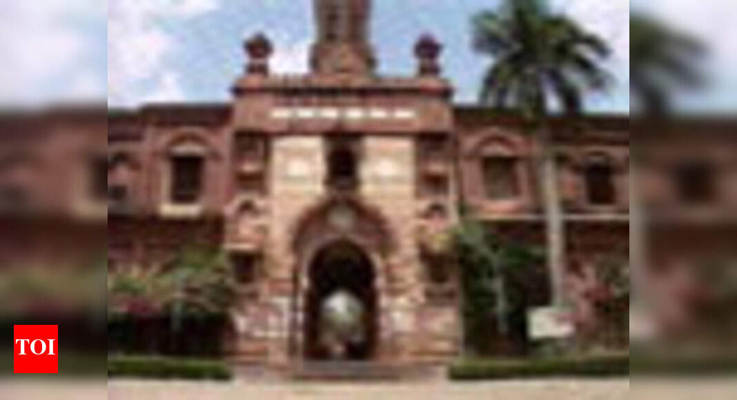 AMU retains minority status - Times of India