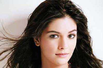 Pooja carries a swiss knife - Times of India