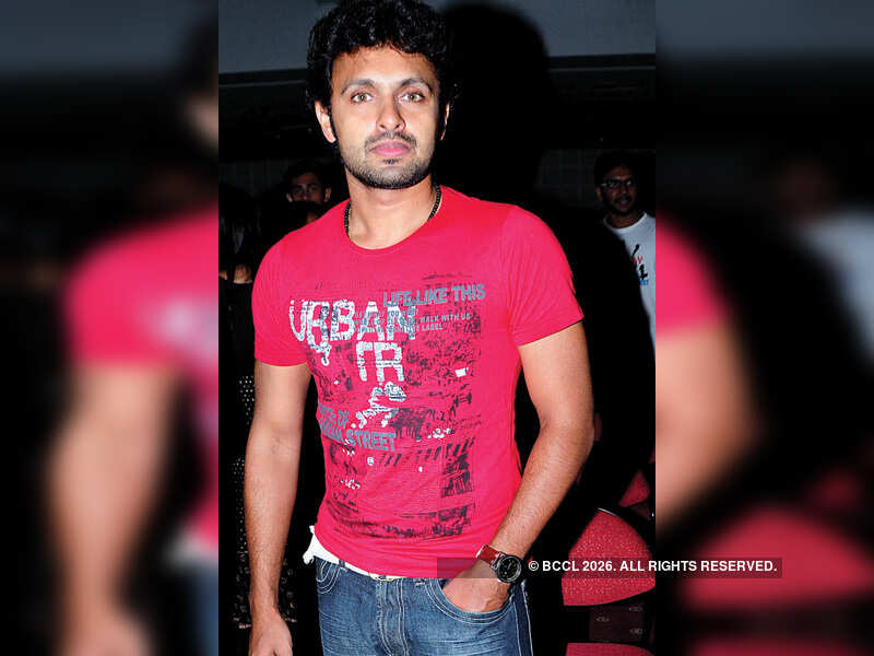 Vineeth Kumar poses in red at the event which marked the who's who of ...