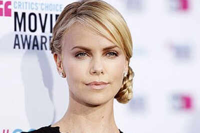 Go for the classic up-sweep hairdo - Times of India