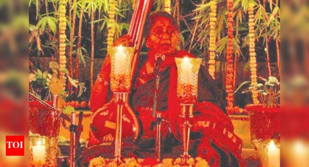 A classical performance by vocalist Mala Ramadorai amidst marigold ...