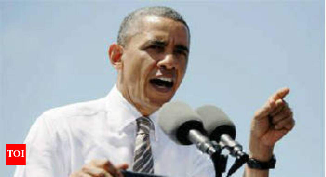 US President Barack Obama throws weight behind yoga - Times of India