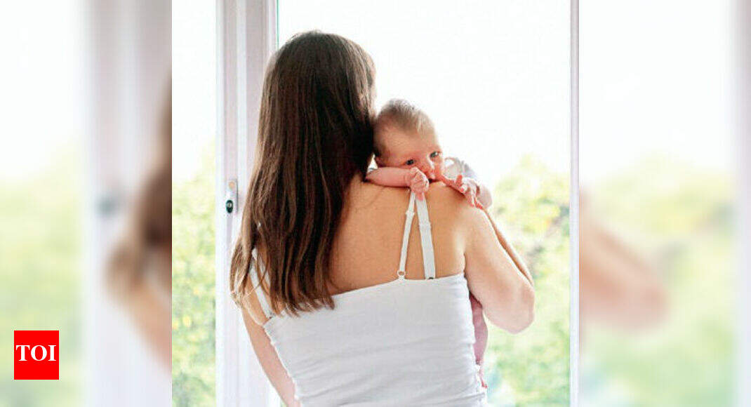 Woman dies, delivers baby, returns to life - Times of India