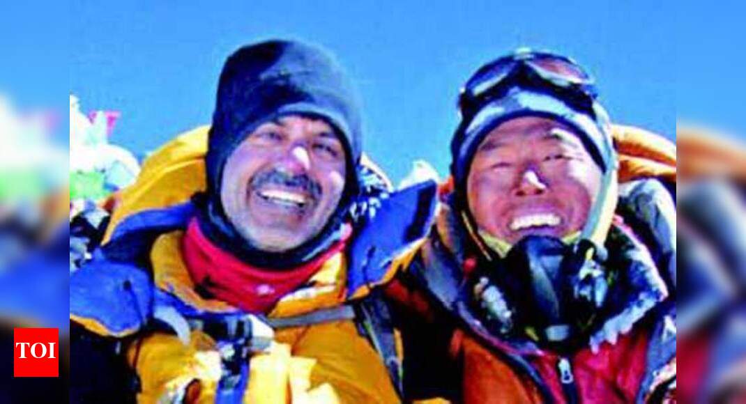 Doc on top: Oncology surgeon climbs Mt Everest - Times of India