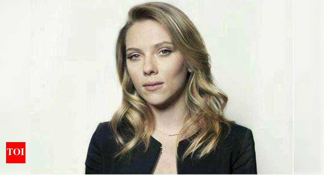 Scarlett Johansson and beau Romaine Duraic indulge in PDA | English ...