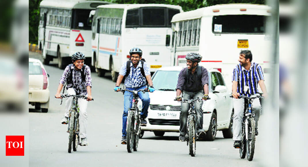 Professionals who cycle to work everyday - Times of India