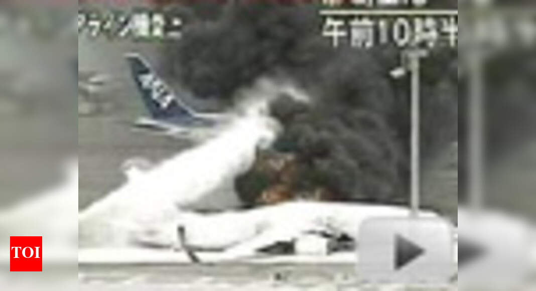 China Airlines plane catches fire - Times of India
