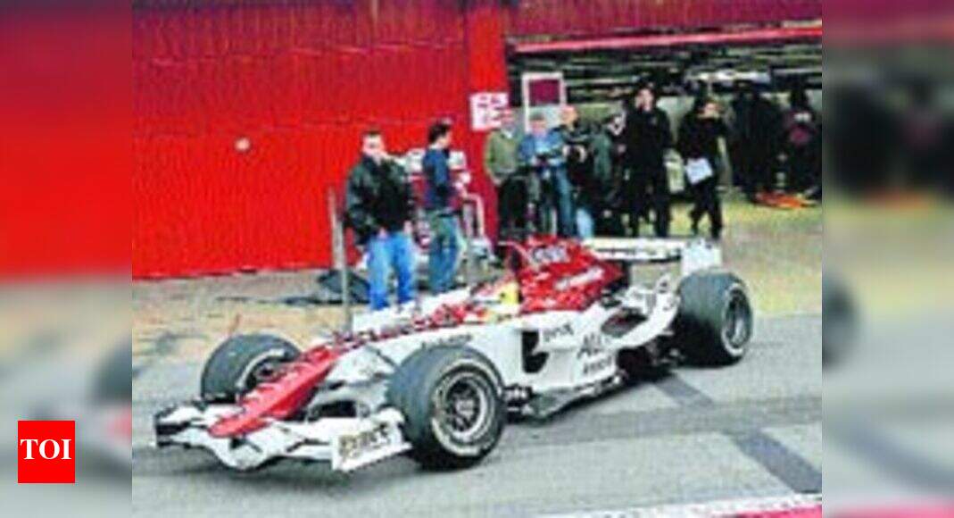 Force India rolls out in new livery | undefined News - Times of India