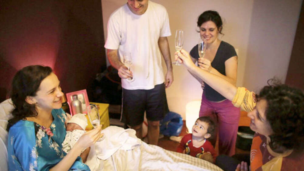 Woman gives birth in inflatable pool | The Times of India