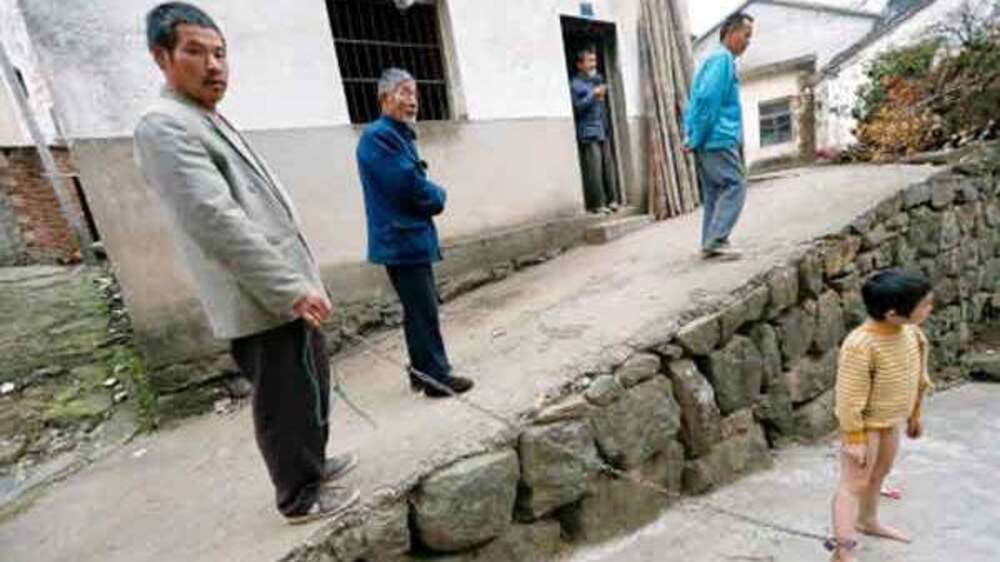 Chinese boy chained up like a dog | The Times of India